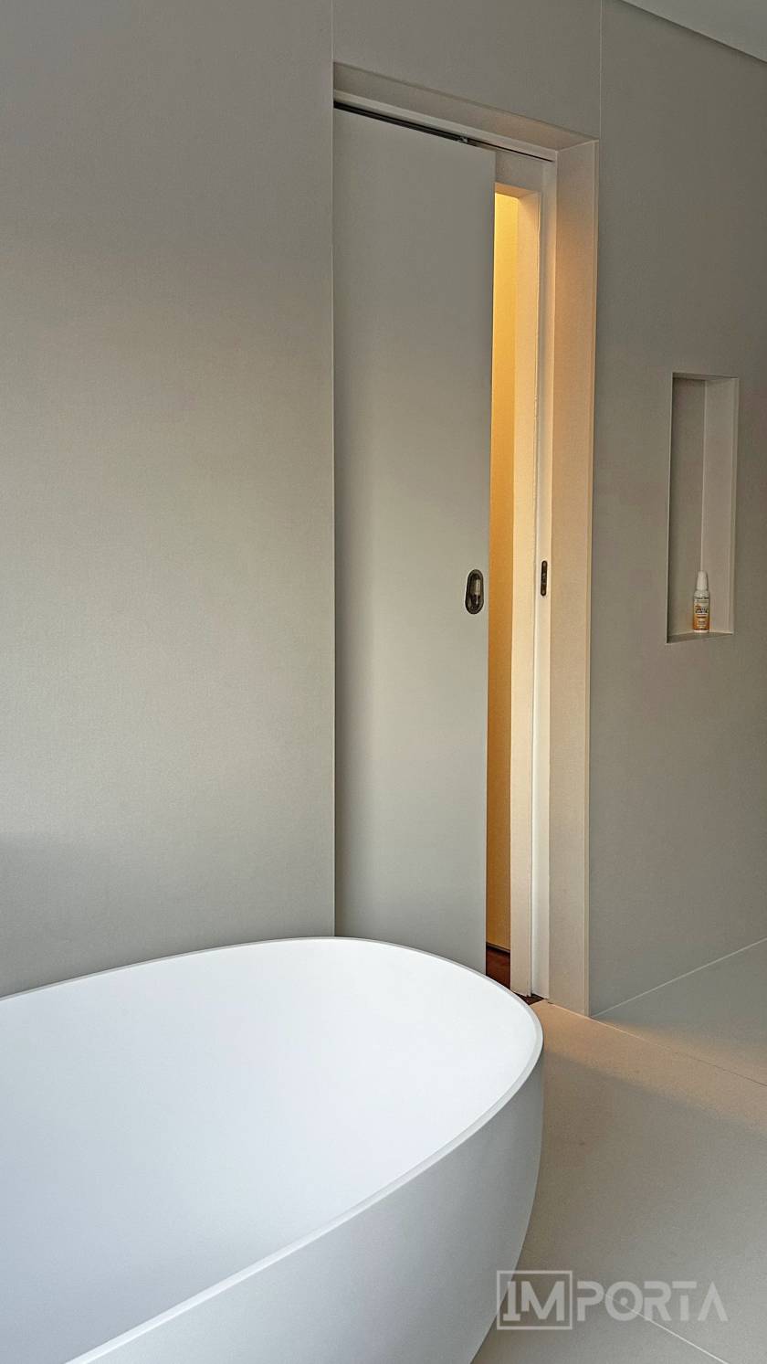 White sliding invisible doors Importa with white HPL in KSA & UAE - Importa